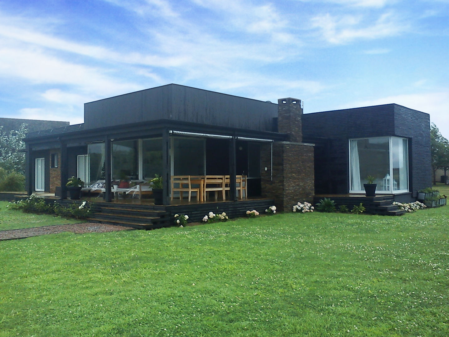 Qué beneficios tiene elegir una casa con siding café
